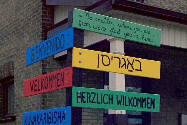 A local couple installed this multilingual welcome sign in Peterborough ...